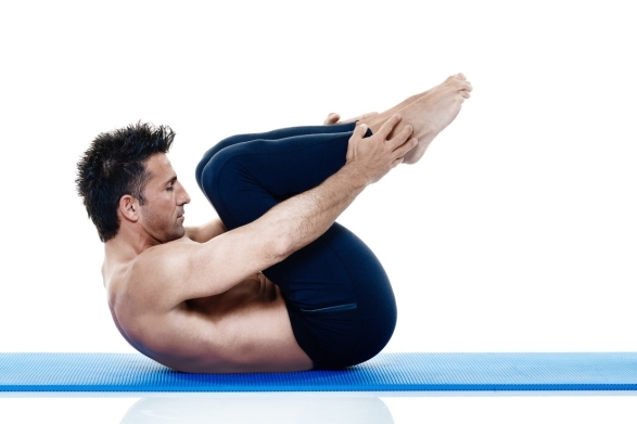 Rolling like a ball o rodar como una pelota. Ejercicio de Pilates